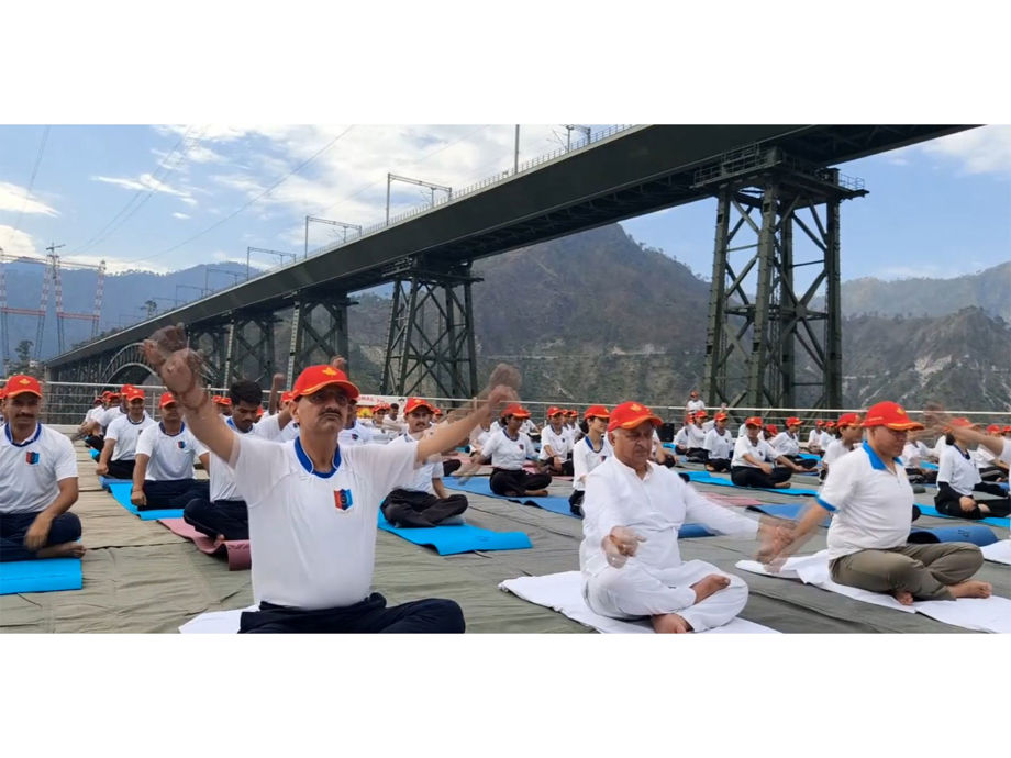 NCC cadets perform yoga at Chenab Rail Bridge on International Yoga Day ...